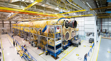 NASA Attaches First of Four RS-25 Engines to Space Launch System ...