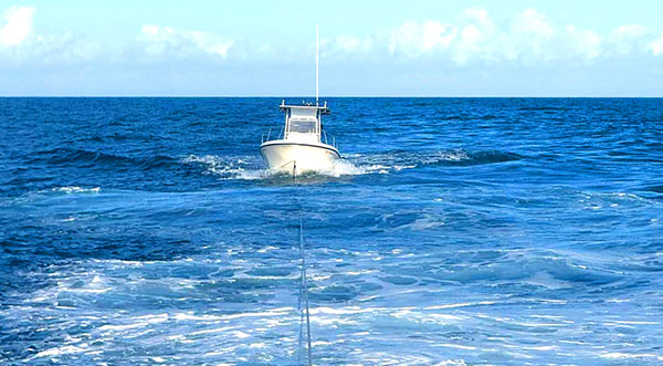 U.S. Coast Guard Rescues Three From Disabled Boat 19 Miles Off Port ...